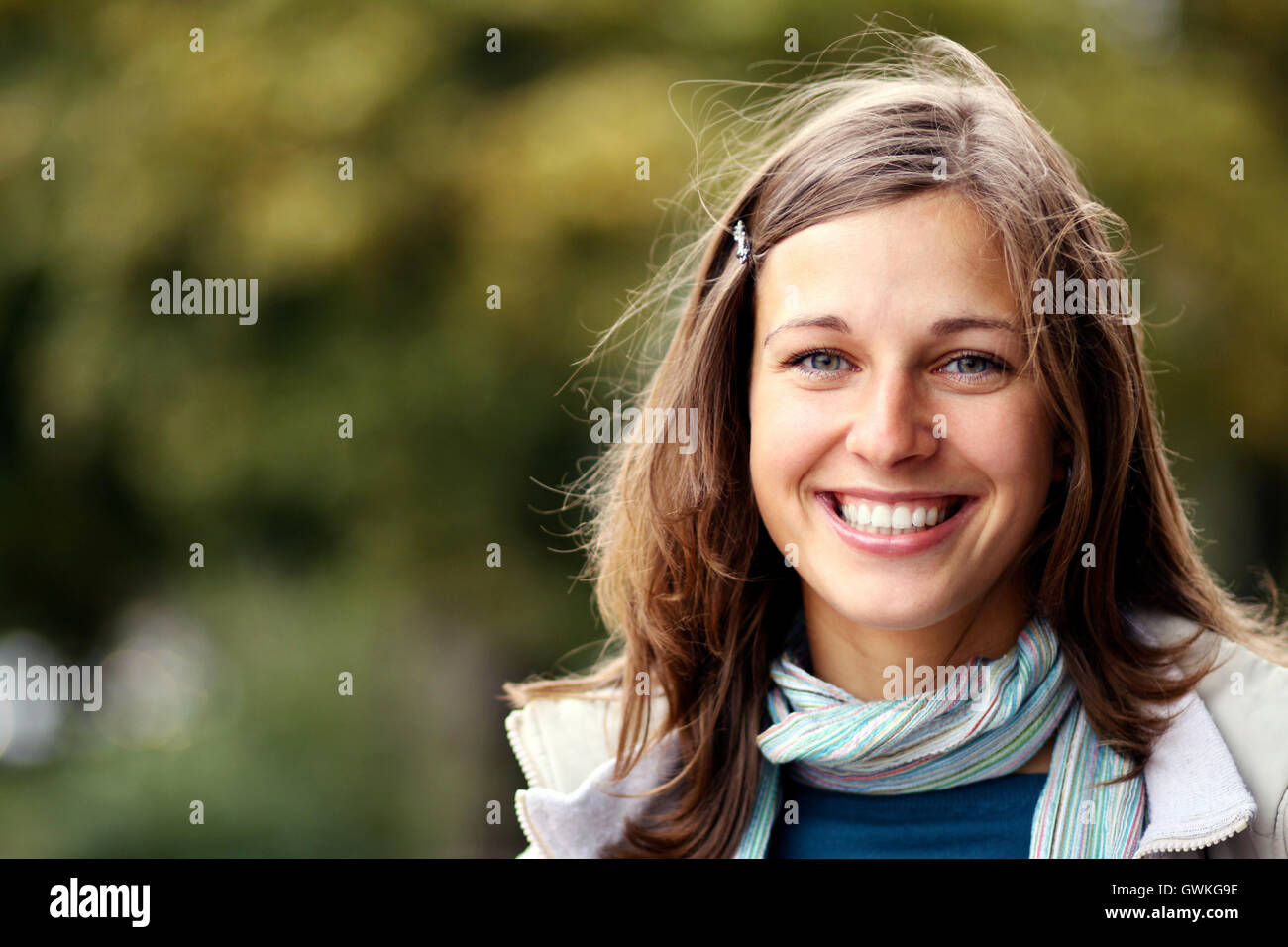 Closeup portrait of a happy young woman smiling Stock Photo - Alamy