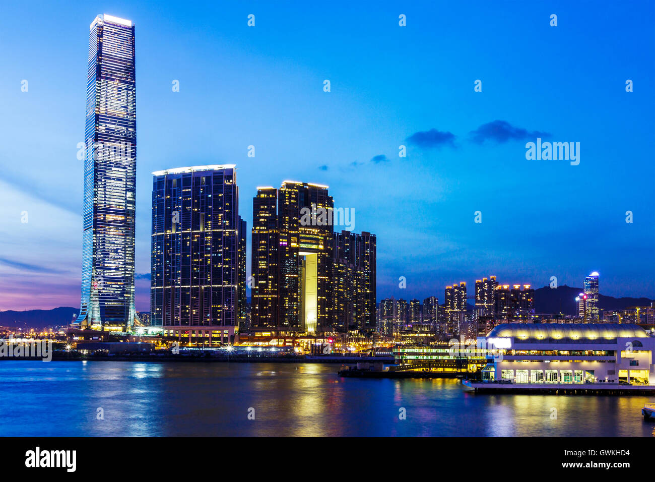 Kowloon skyline in Hong Kong at night Stock Photo - Alamy