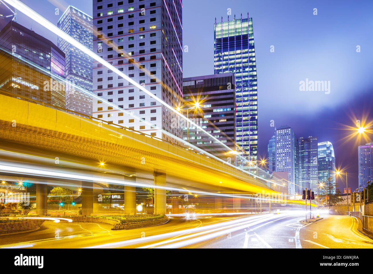 Busy traffic in city at night Stock Photo - Alamy