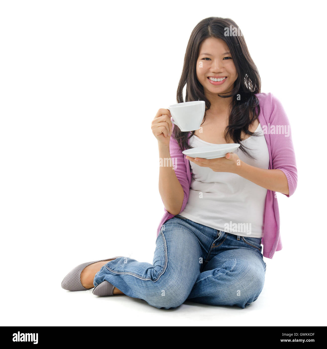 Asian female drinking tea Stock Photo - Alamy