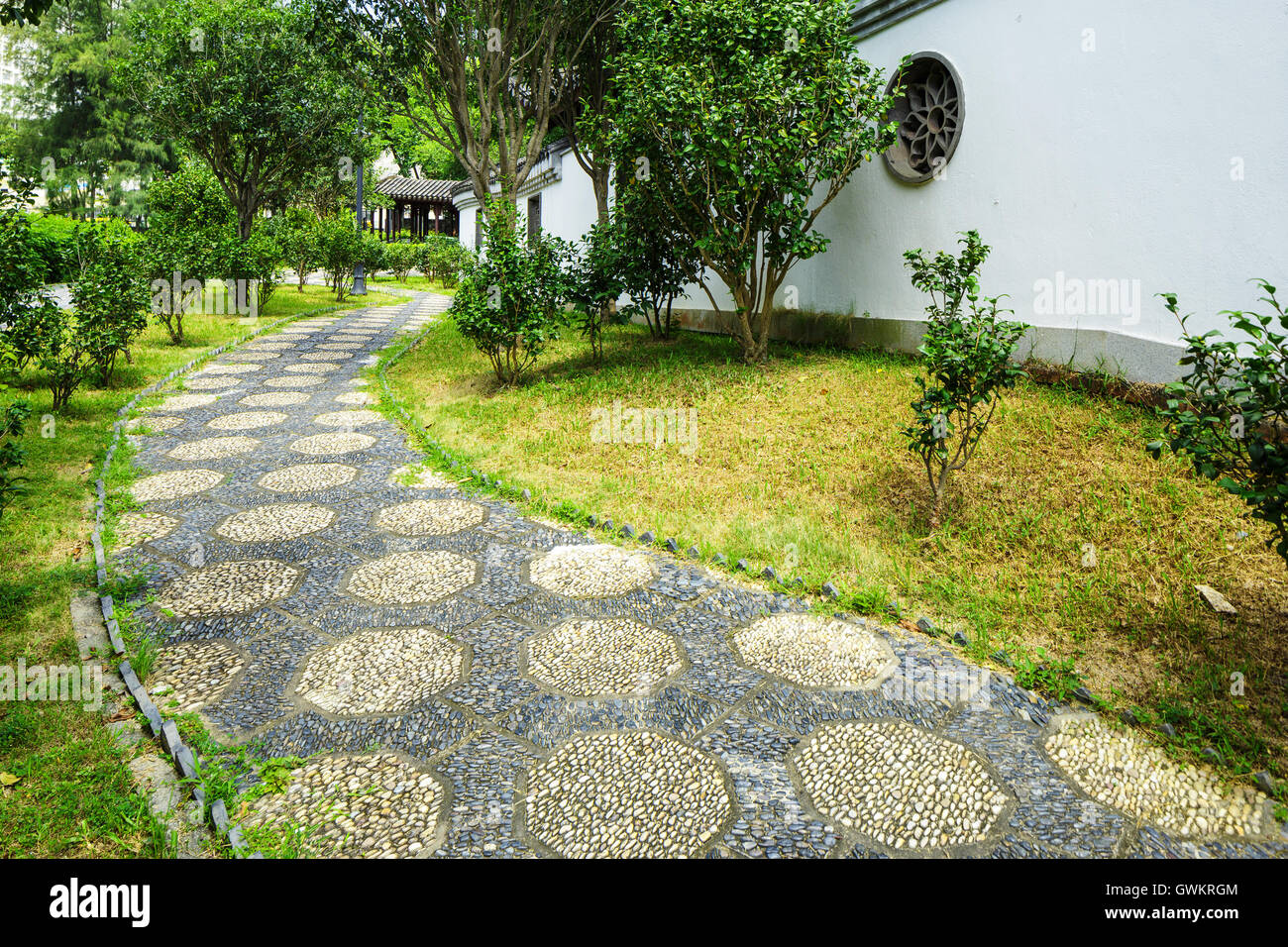 Pebble stone path in the chinese garden Stock Photo - Alamy