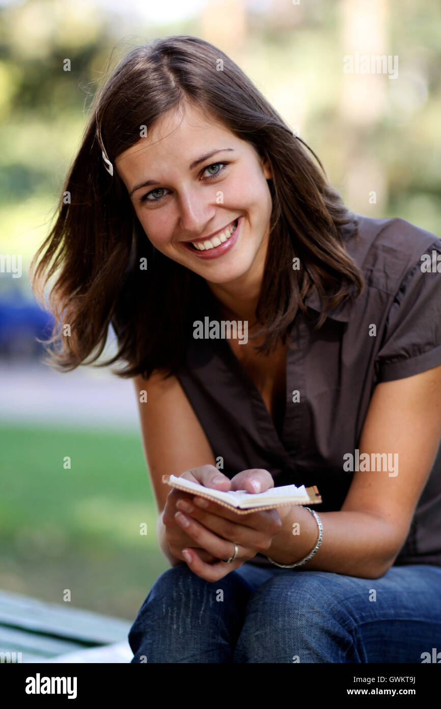 Closeup portrait of a happy young woman smiling Stock Photo - Alamy