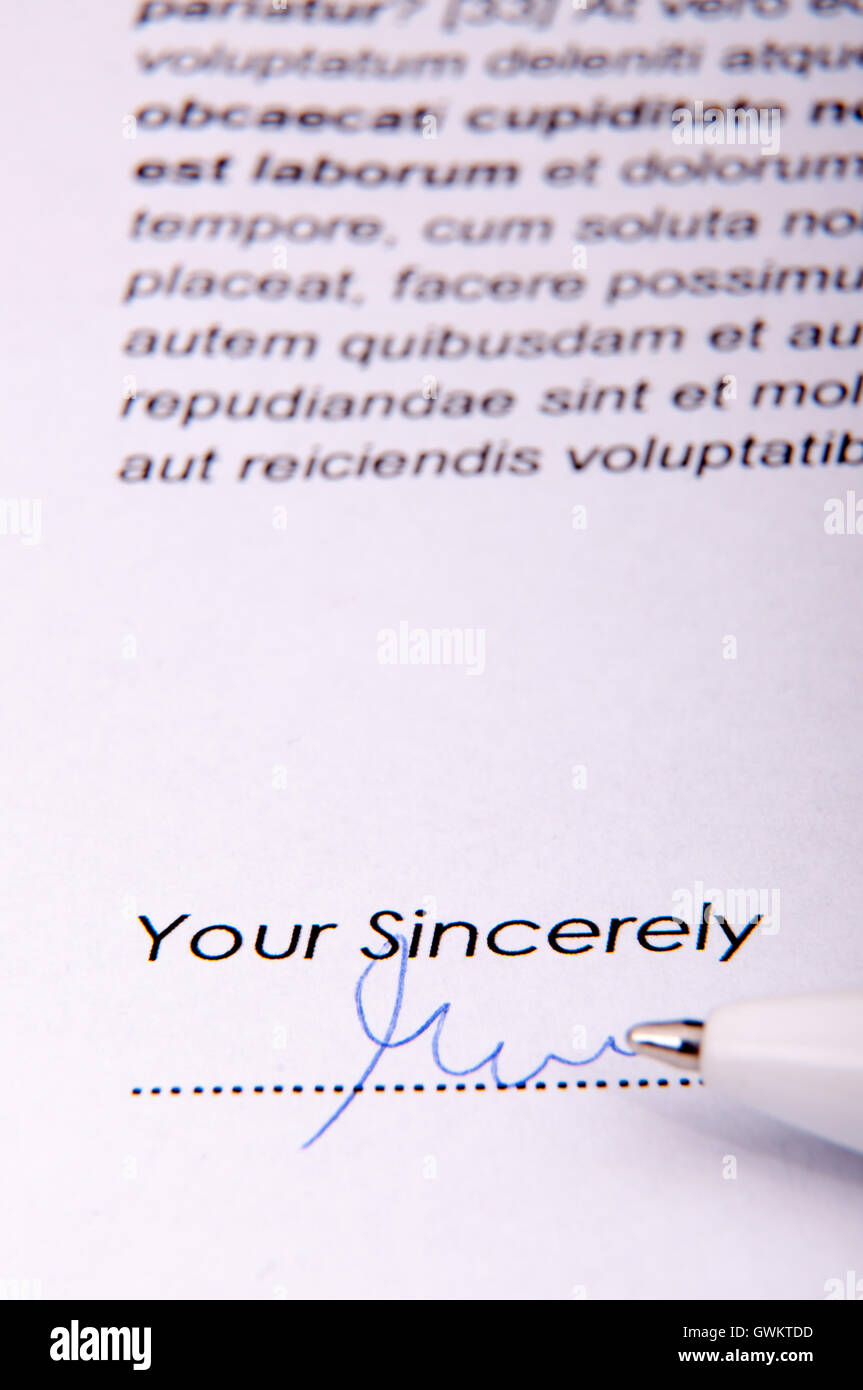 Signature over agreement Stock Photo - Alamy