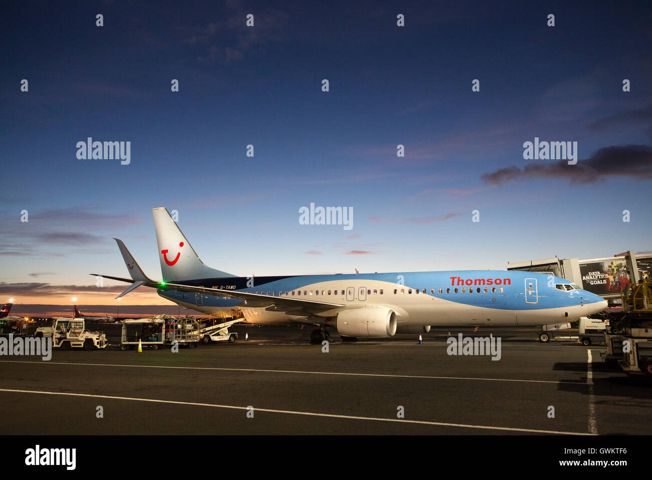 A Thomson airliner on the runway at Newcastle International Airport ...