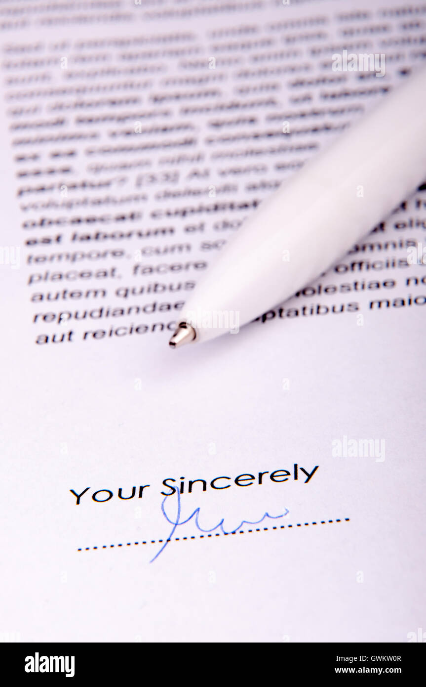 Signature over agreement Stock Photo - Alamy