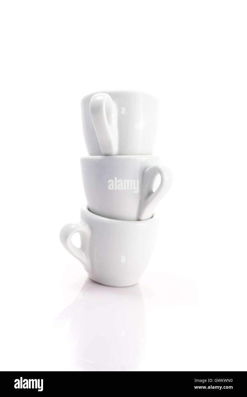 stack of espresso cups isolated on a white background Stock Photo - Alamy