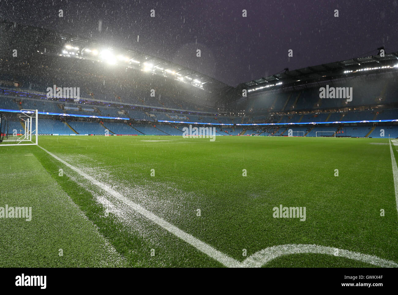 Heavy rain before the Champions League match at the Etihad Stadium ...