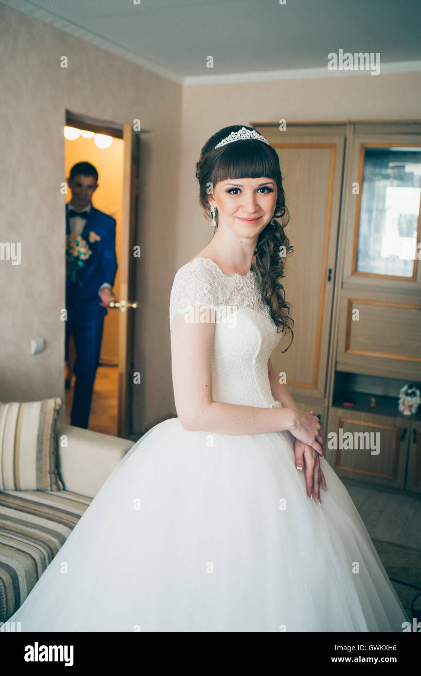 young bride waiting for the groom in house Stock Photo - Alamy