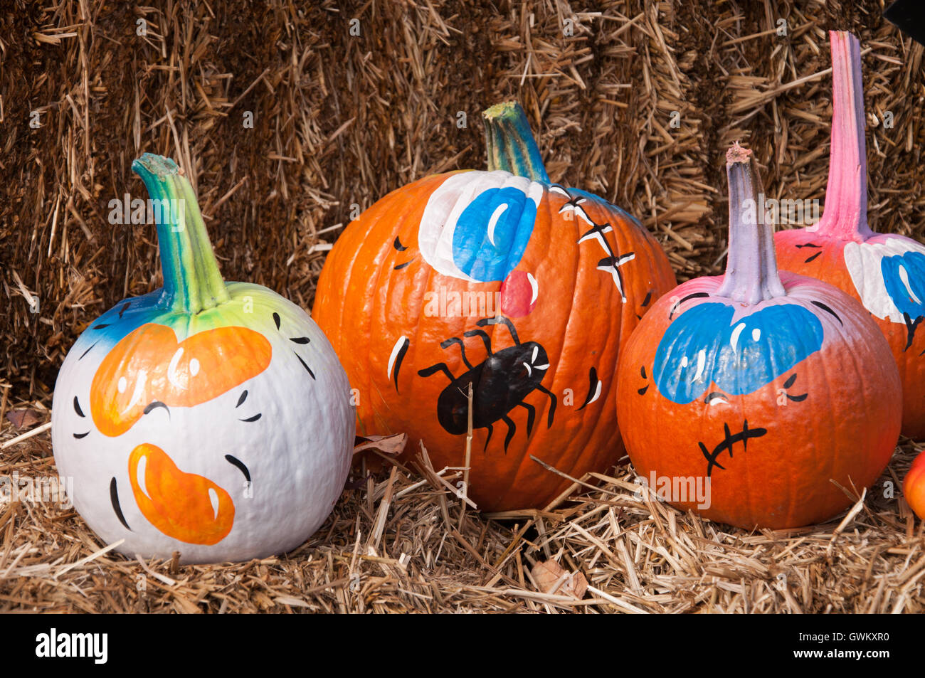 Faces painted on pumpkins Stock Photo - Alamy