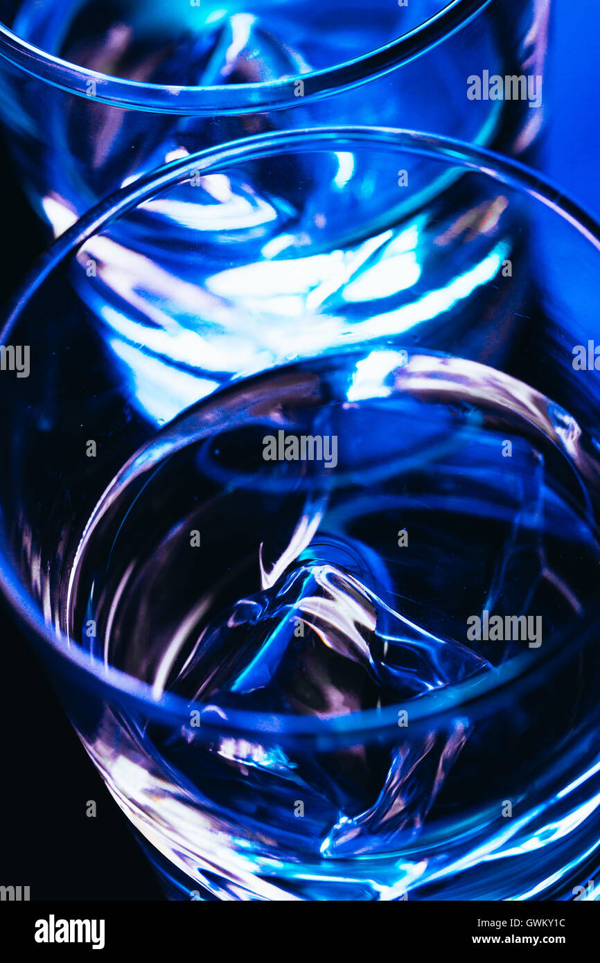 Two glasses of vodka with ice closeup Stock Photo - Alamy