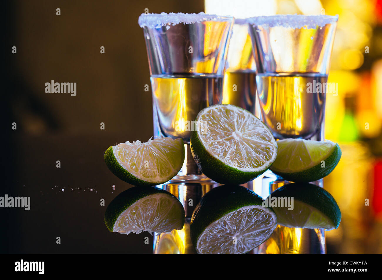 stack of tequila with salt close up on blurred background Stock Photo ...