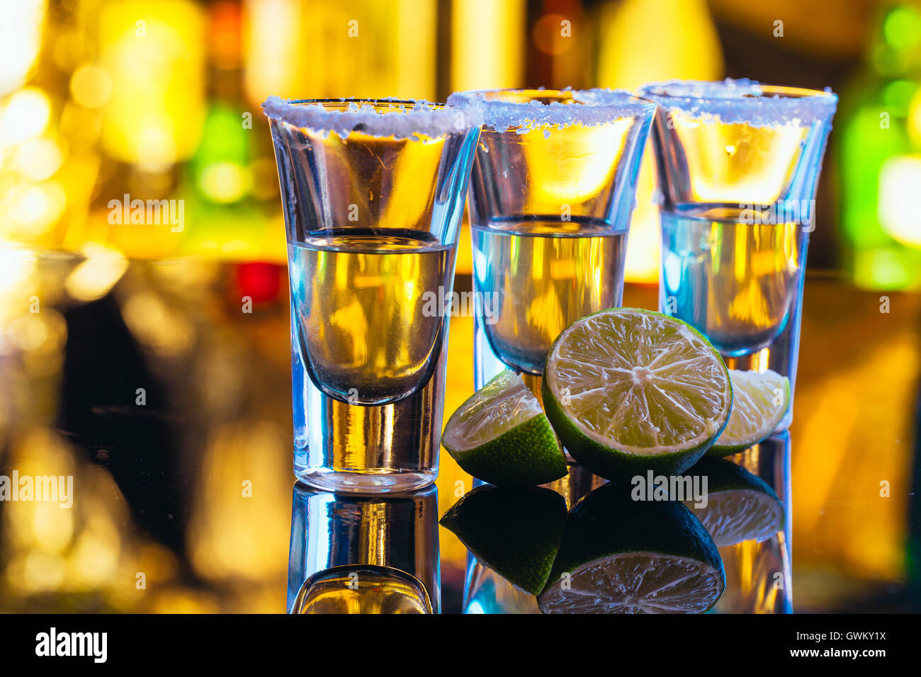 stack of tequila with salt close up on blurred background Stock Photo ...
