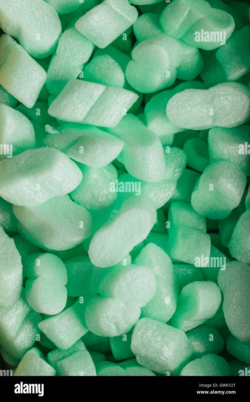 pieces of green styrofoam in carton box background Stock Photo - Alamy