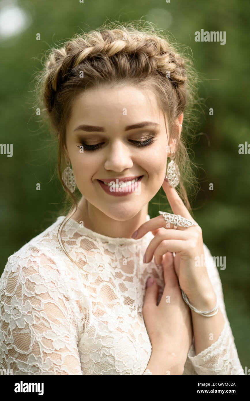 Girl in a beautiful white dress. young friendly girl looking. Young ...