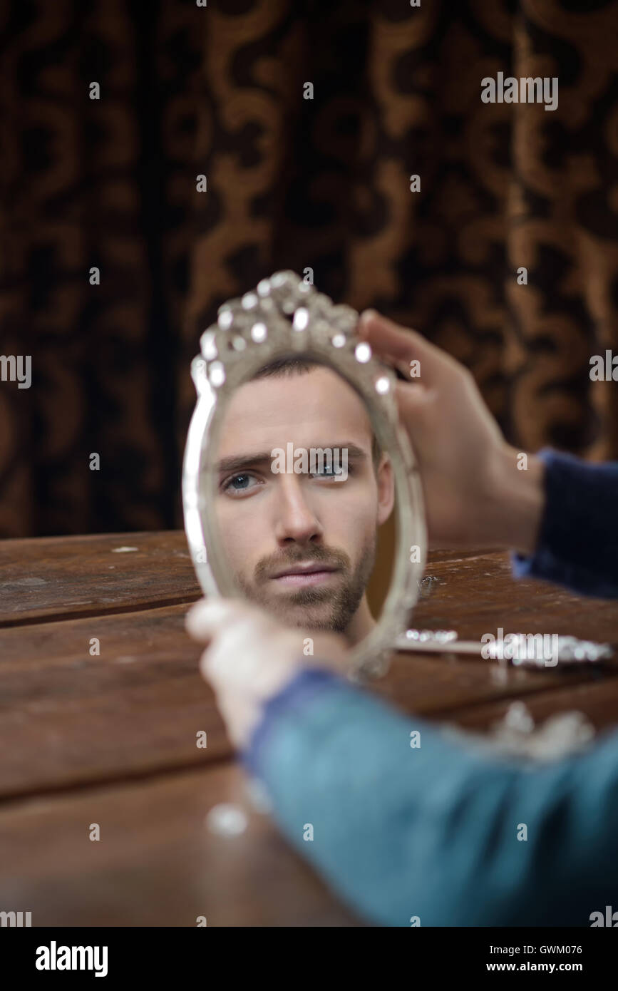 reflection of young handsome men in mirror Stock Photo - Alamy