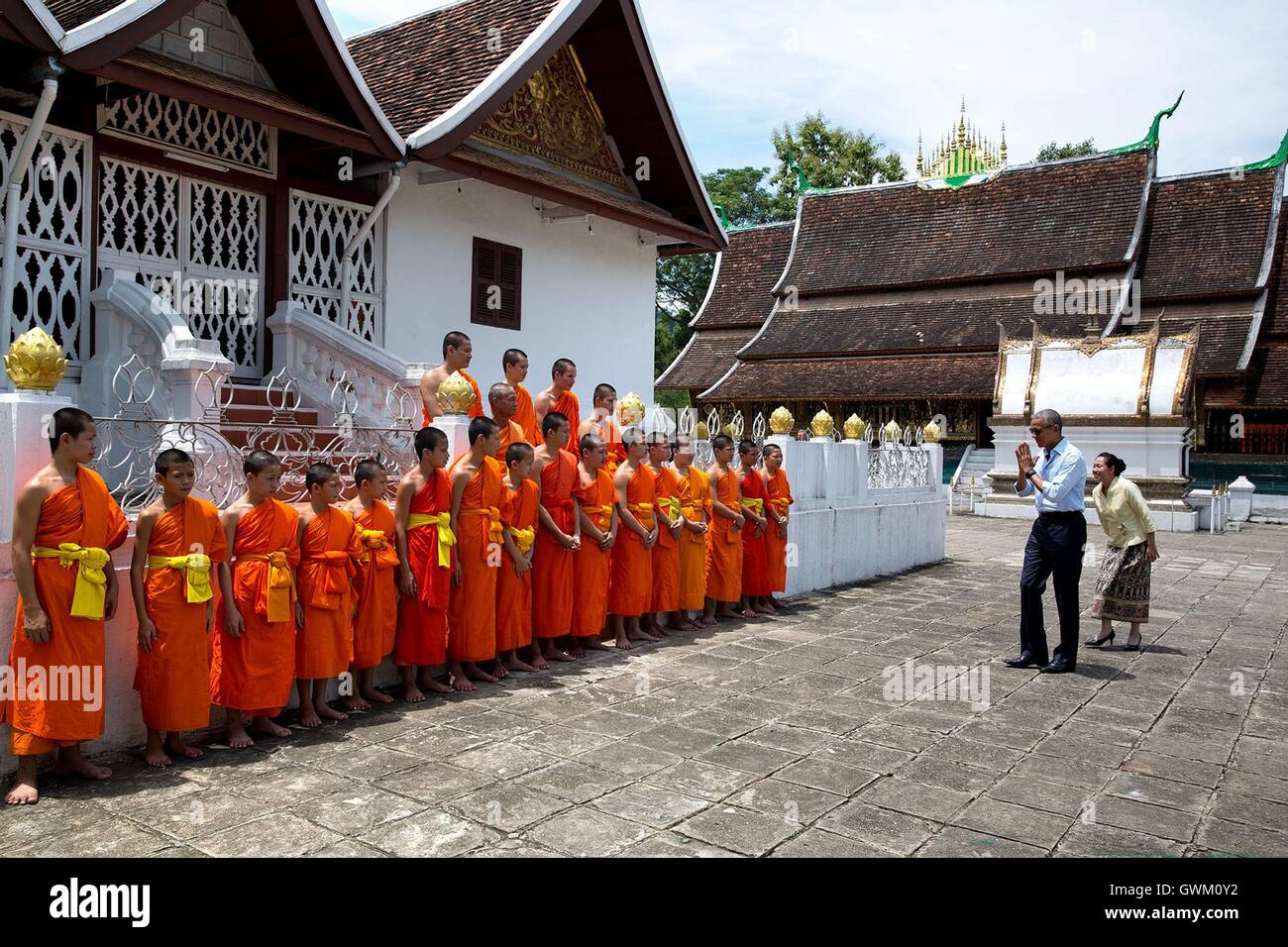 U.S President Barack Obama greets temple monks with a nop at the Wat ...