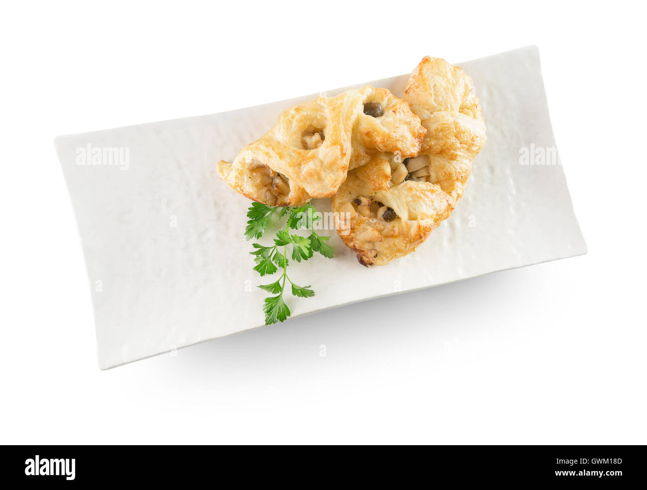 meat puffs on white plate isolated on the white background Stock Photo ...