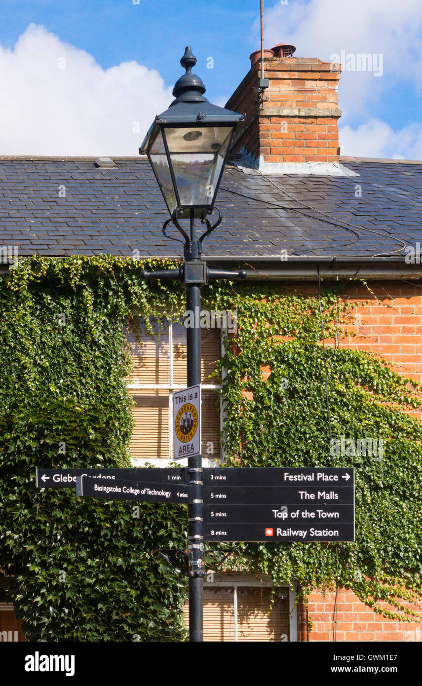 A pedestrian directional signpost in the old market town of Basingstoke ...