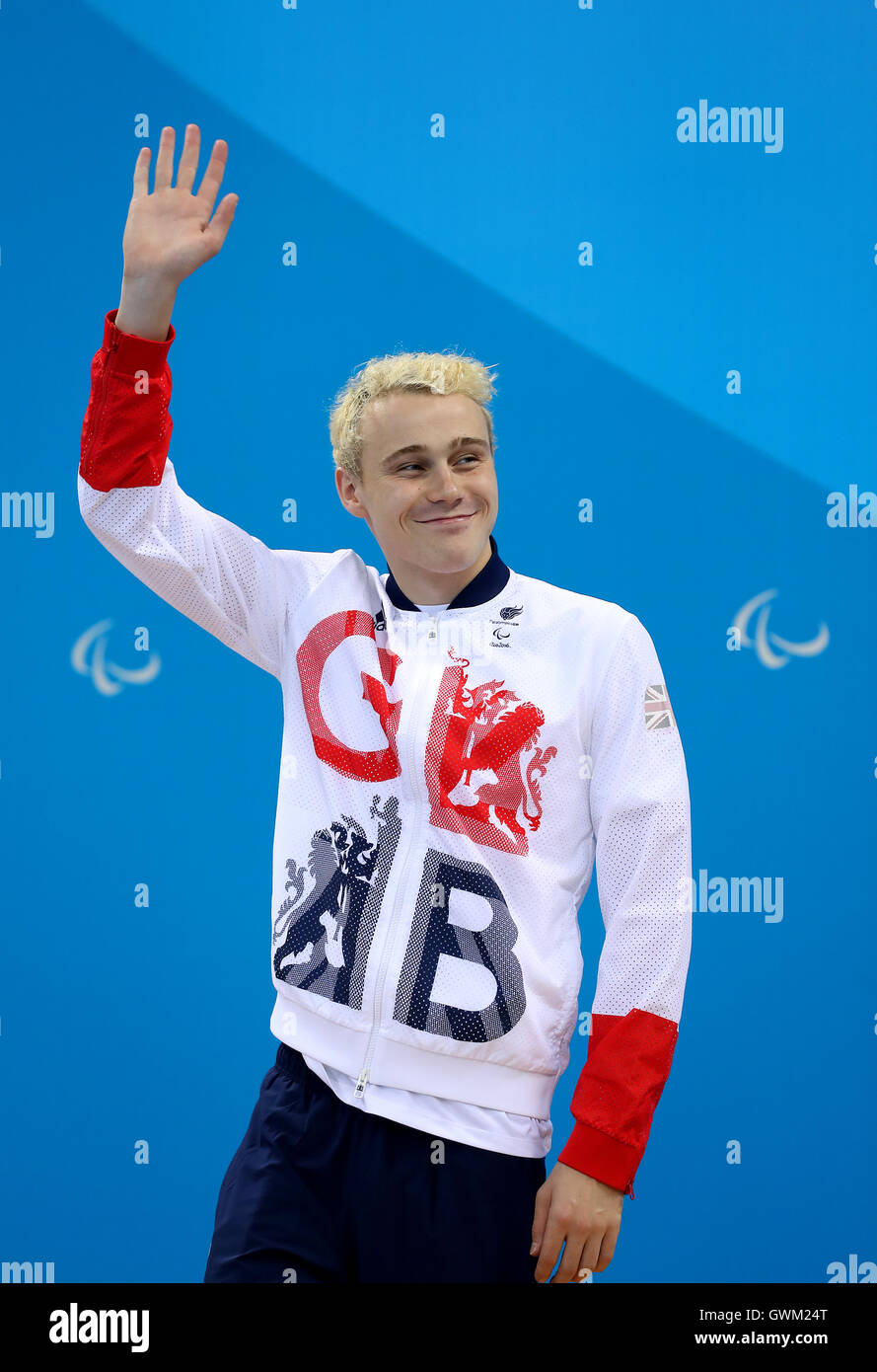 Great Britain's Oliver Hynd celebrates on the podium after winning ...