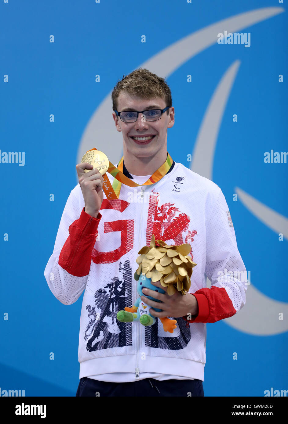 Great Britain's Matthew Wylie poses with his gold medal after winning ...