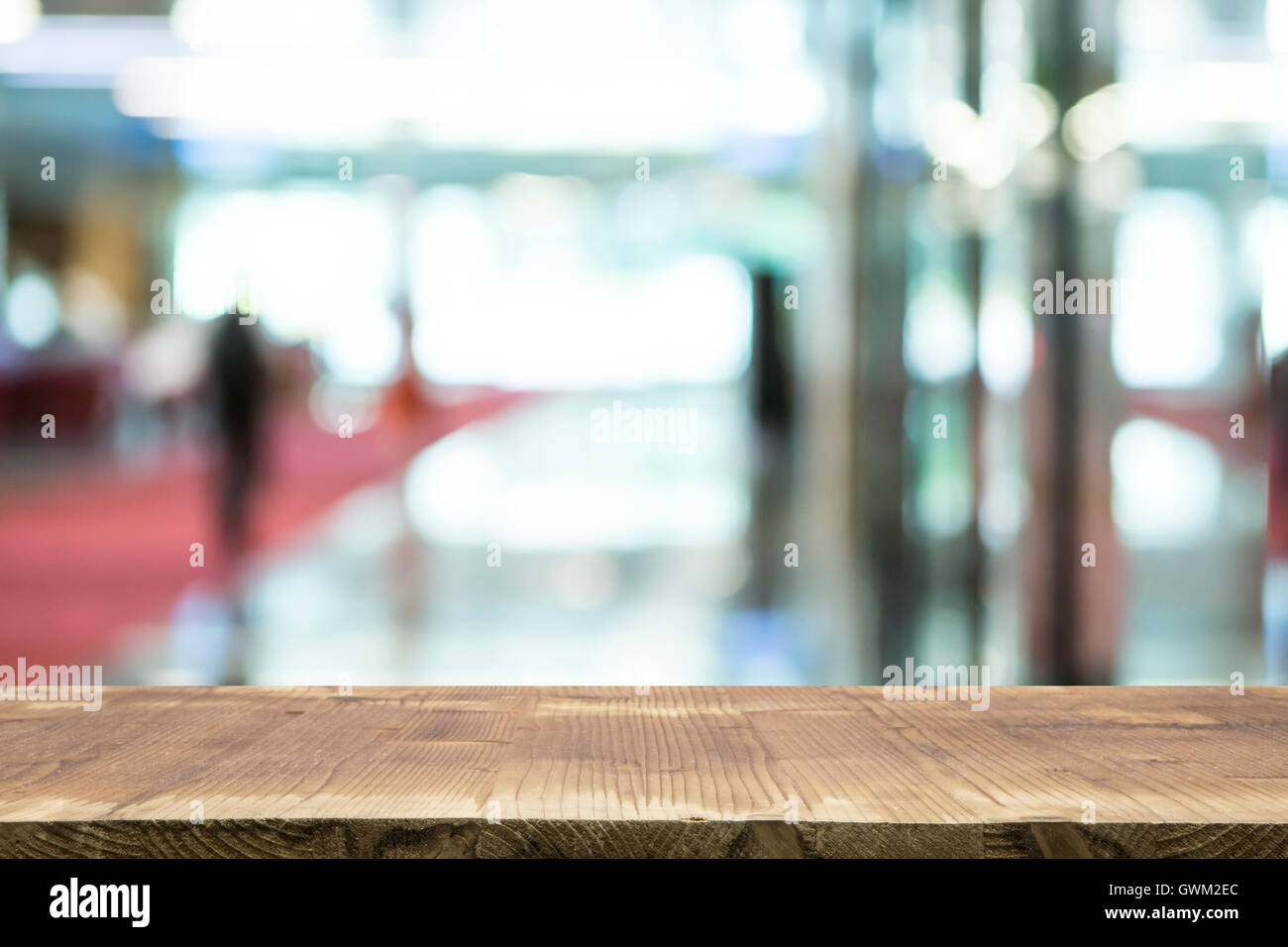 Image of wooden table in front of blurred background. Empty table and ...