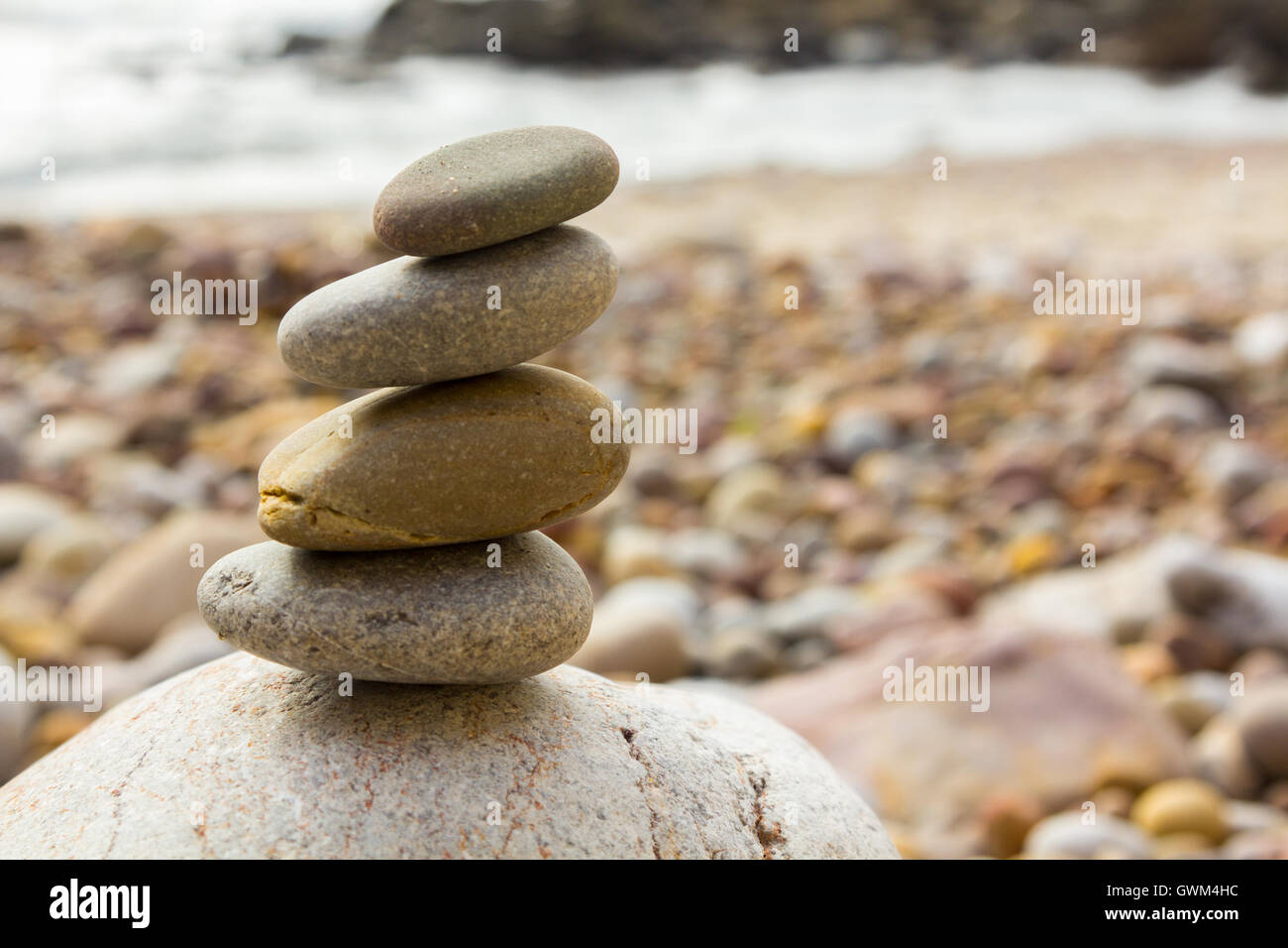 Stones stacked on beach hi-res stock photography and images - Alamy
