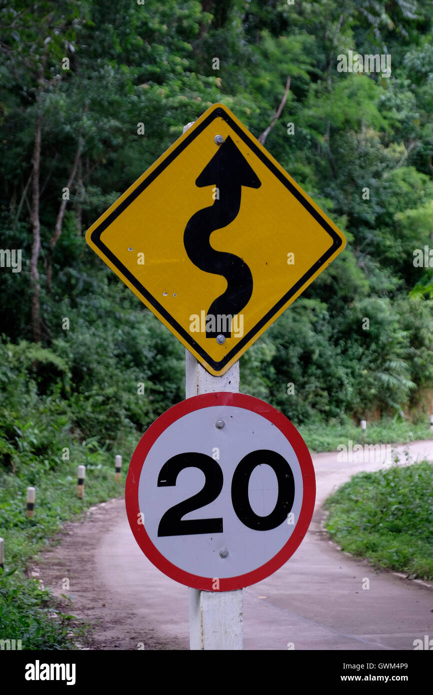 Curved road warning sign near the village of Pai in Mae Hong Son, a ...