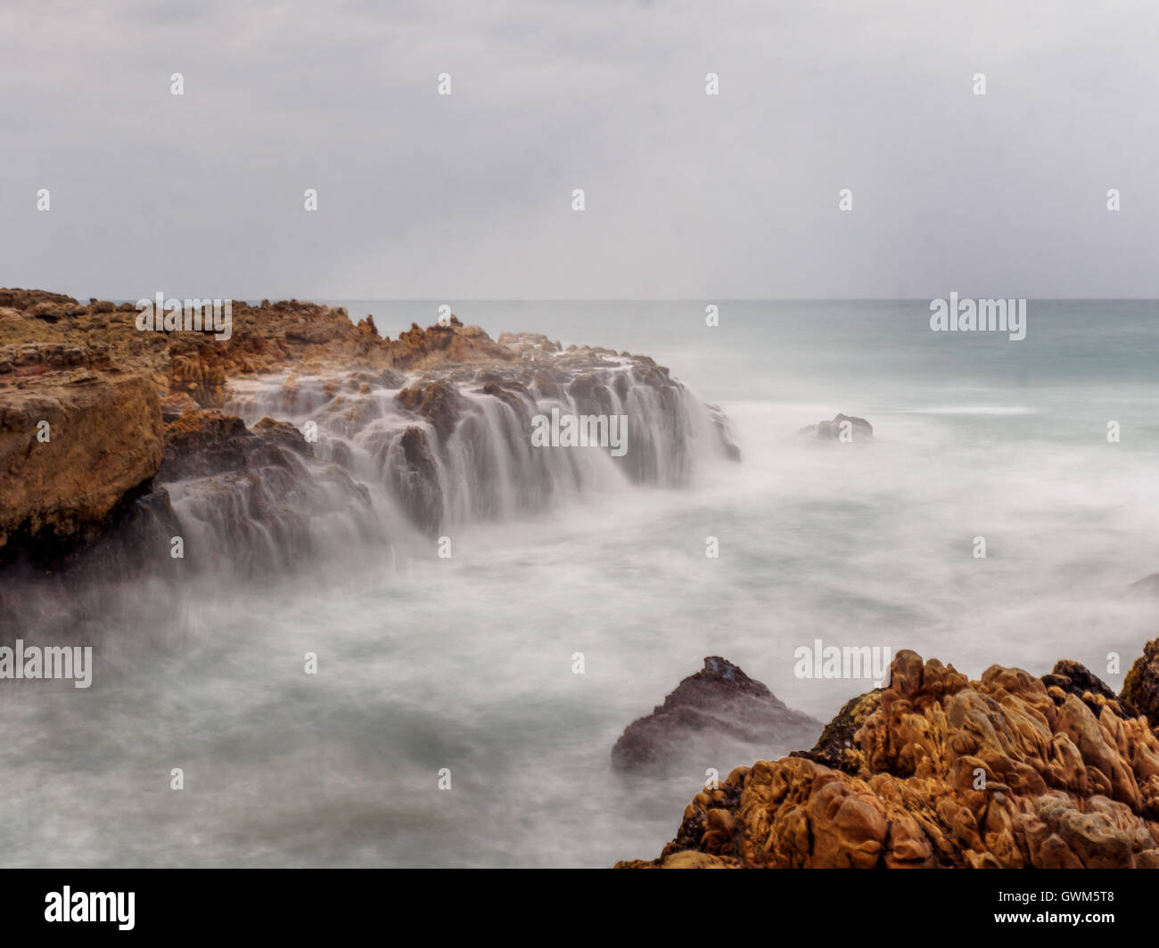 Water washing rocks hi-res stock photography and images - Alamy