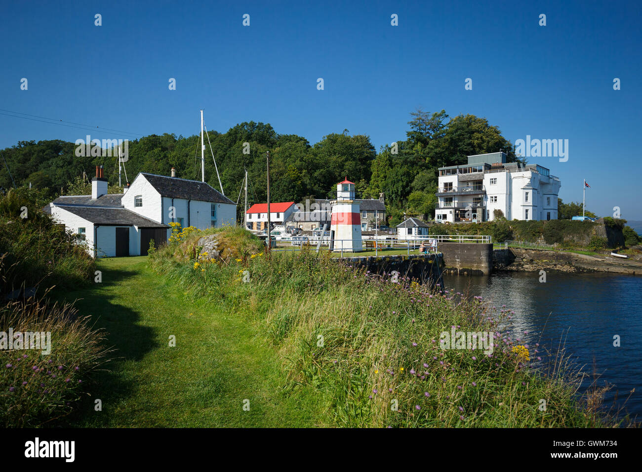 Lighthouse and hotel at Crinan Sea Lock, Lochgilphead, Scotland Stock ...