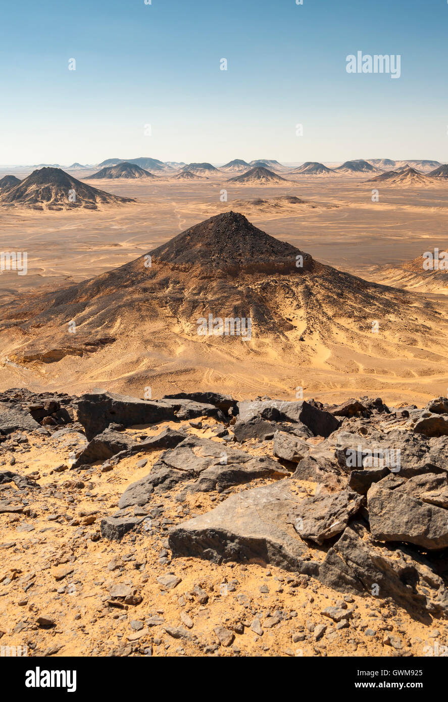 Volcano-shaped Pyramid Mountains of Black Desert, Egypt Stock Photo - Alamy