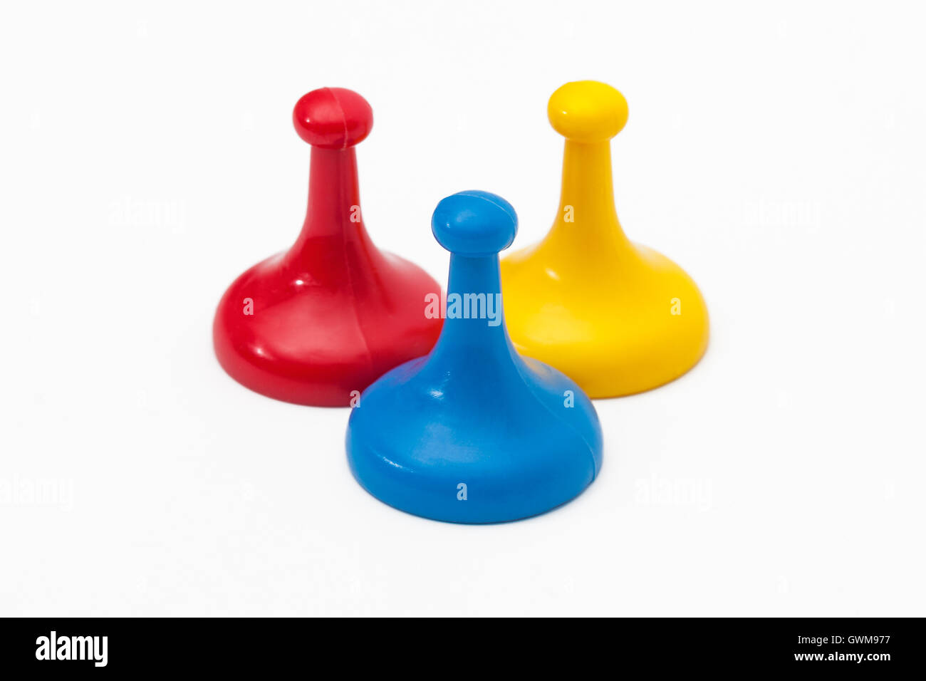 Three game tokens in primary colors Stock Photo - Alamy
