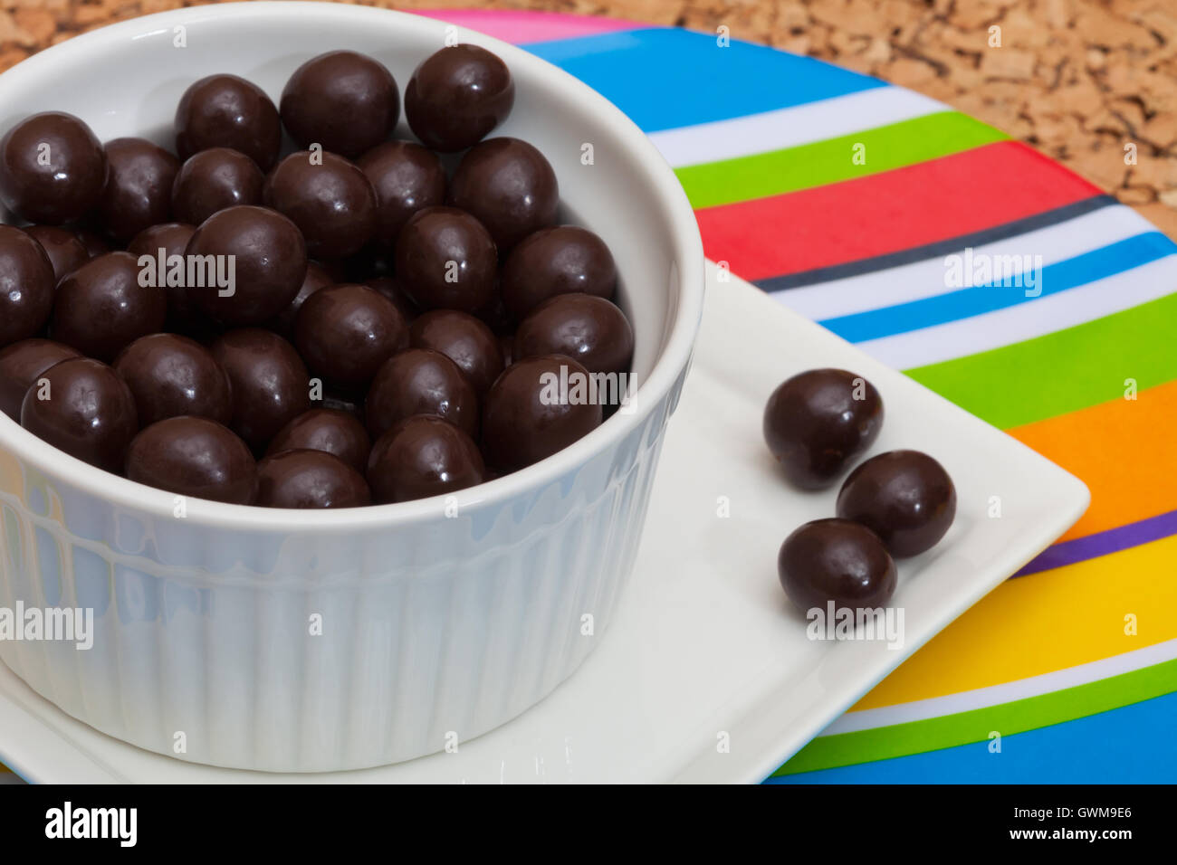 Chocolate covered espresso coffee beans in a cup Stock Photo - Alamy