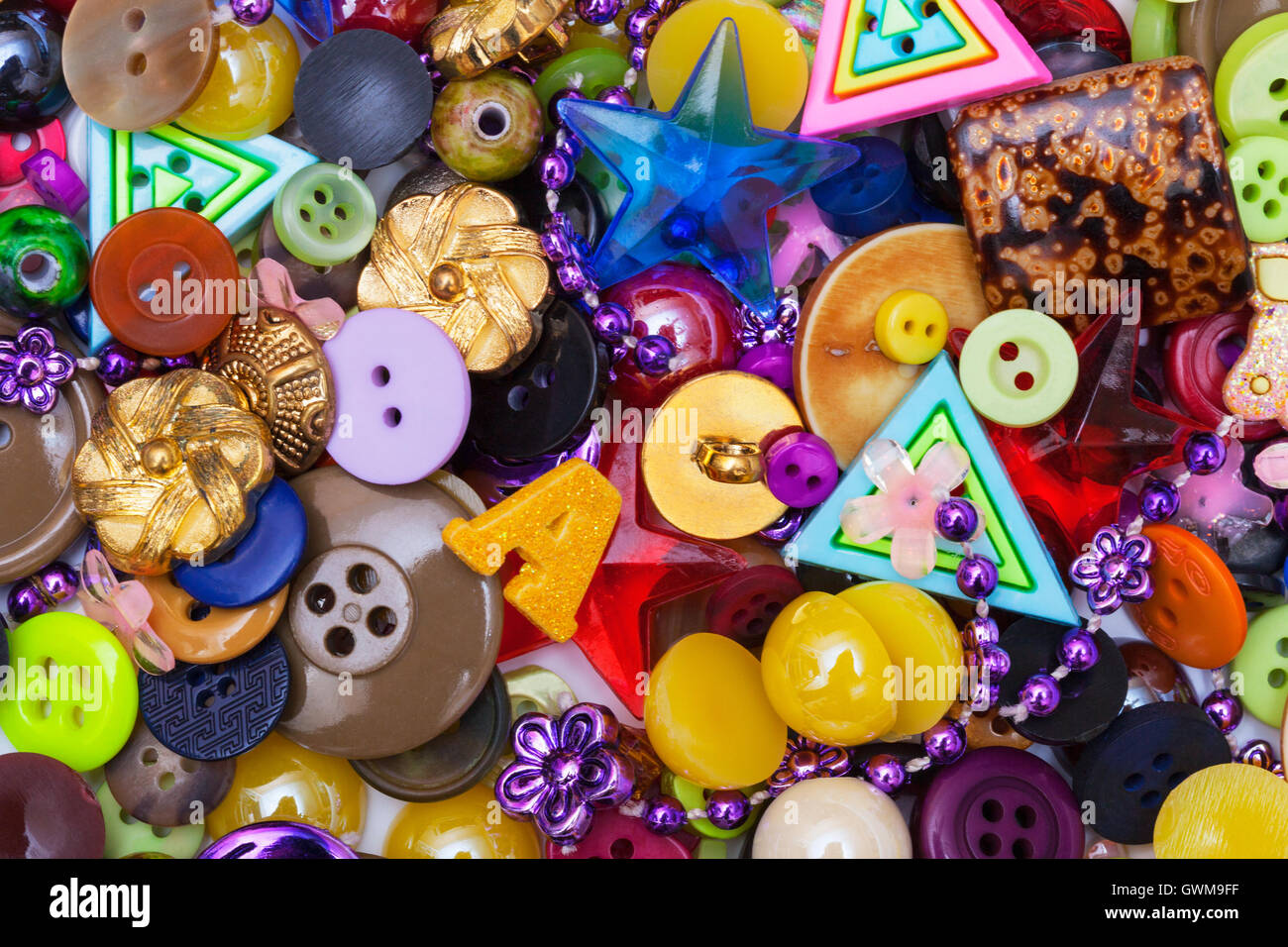 Miscellaneous buttons and beads for arts and crafts Stock Photo - Alamy