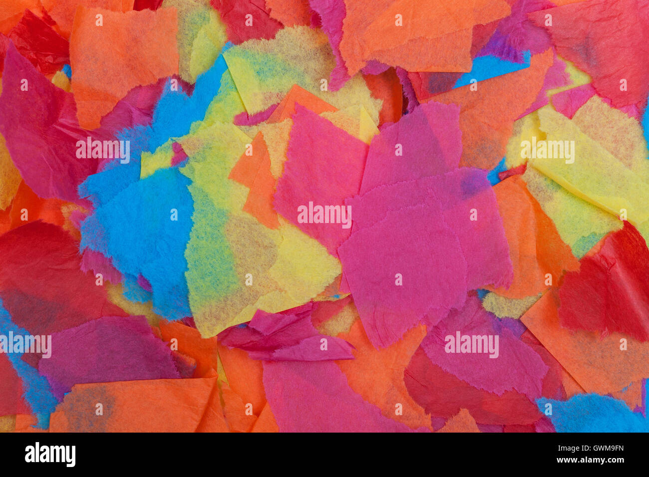 Colored tissue paper in different sized pieces Stock Photo - Alamy