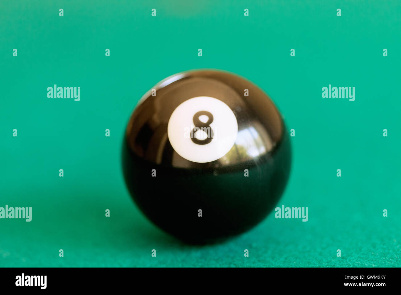 Close-up of the eight ball on a pool table Stock Photo - Alamy