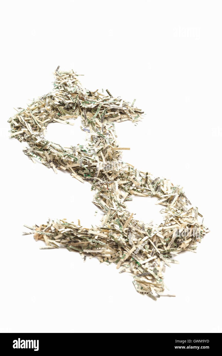 Shredded US currency in the shape of a dollar sign Stock Photo - Alamy