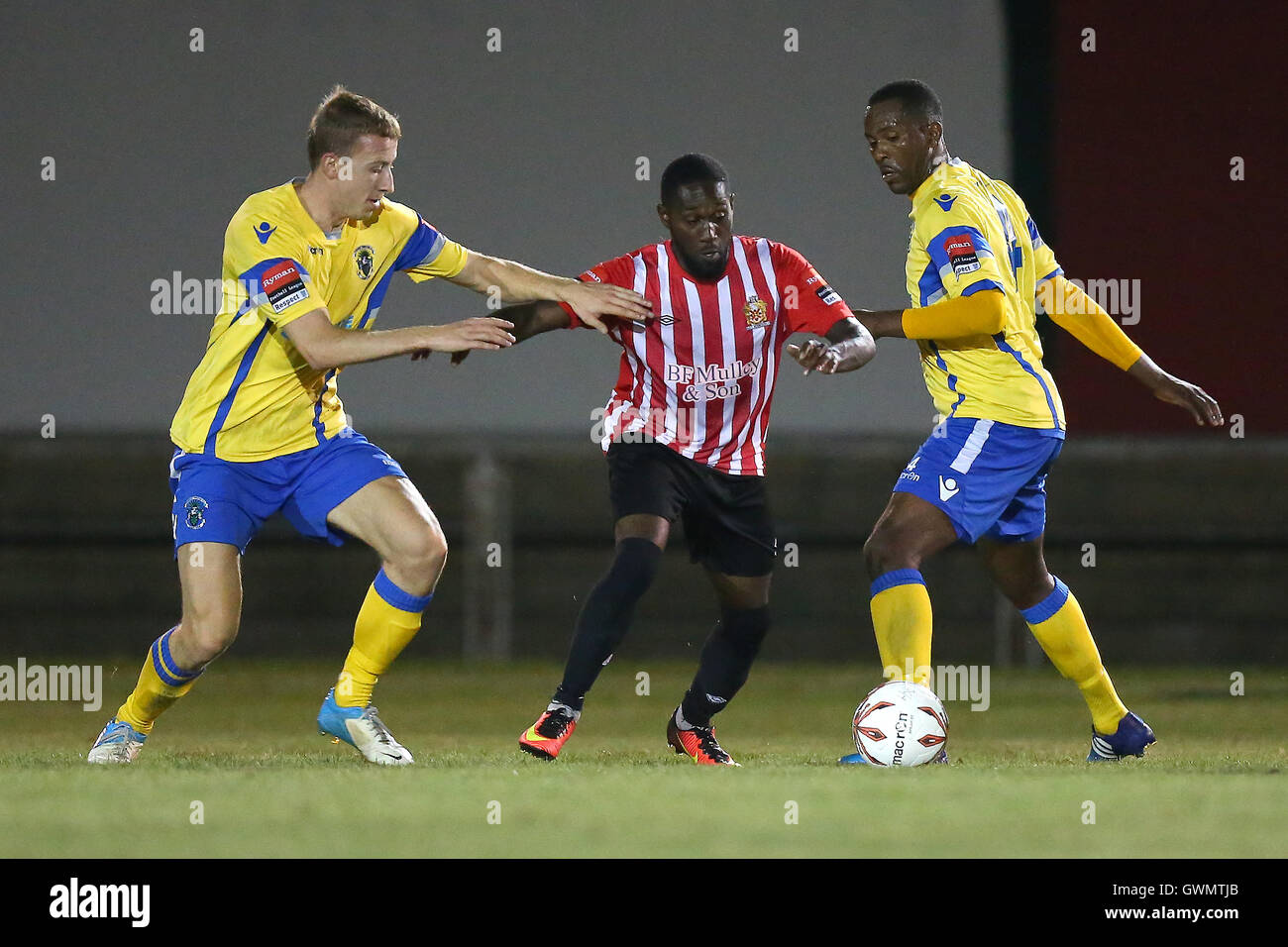 Ayrton Coley of Hornchurch evades Dewayne Clarke of Haringey during AFC ...
