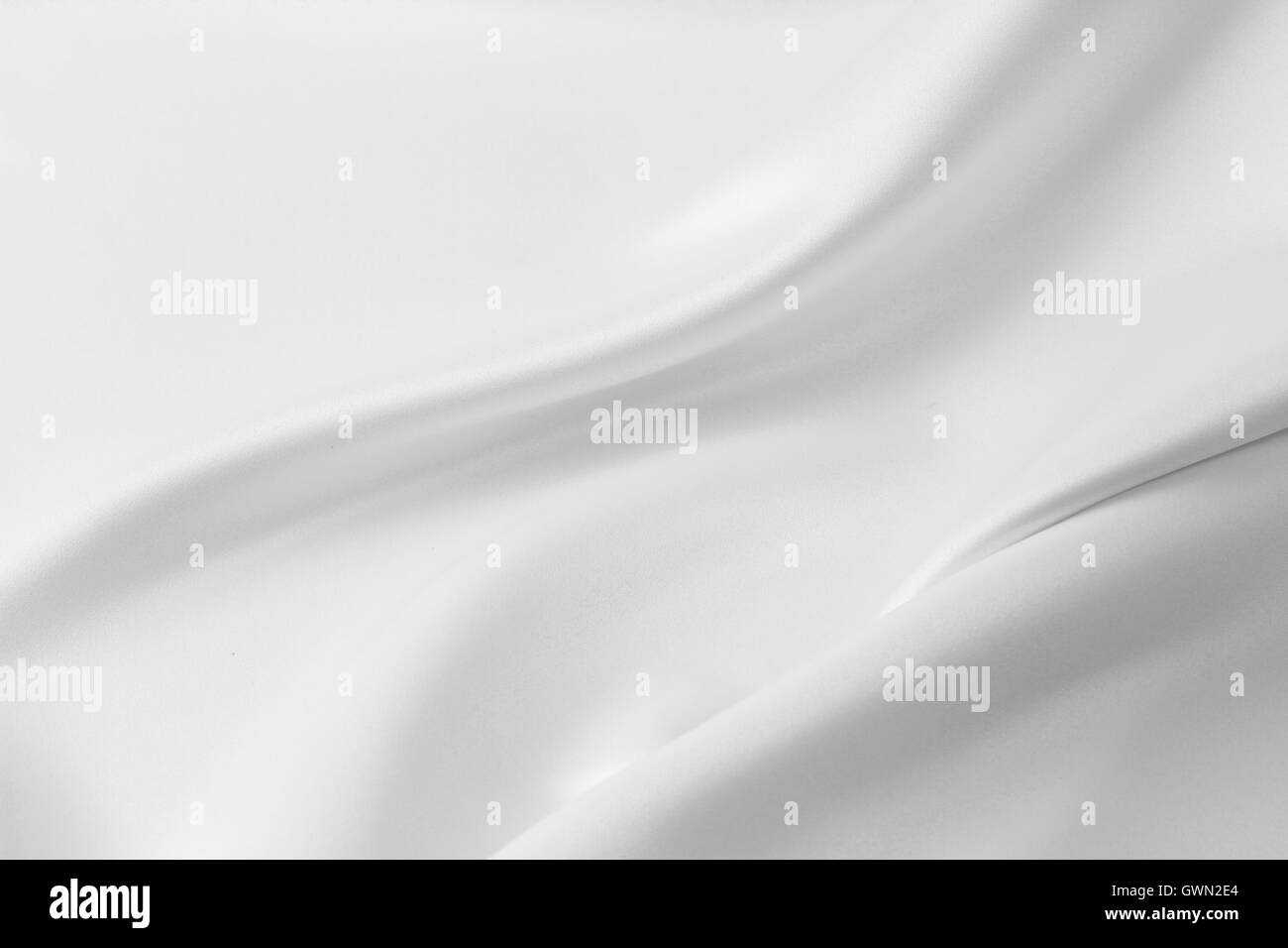 Closeup of rippled white silk fabric Stock Photo - Alamy