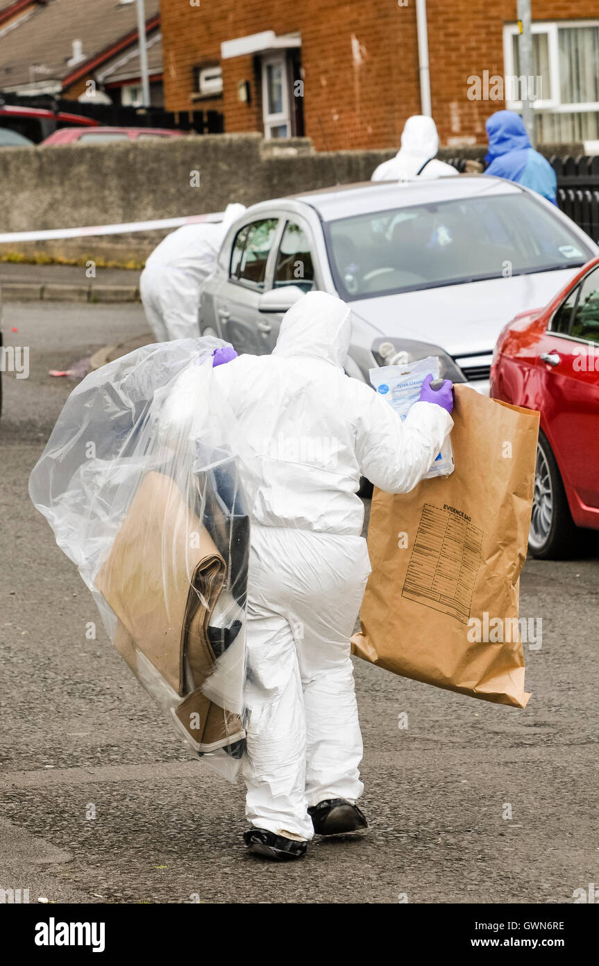 Forensics police white boiler suit hi-res stock photography and images ...