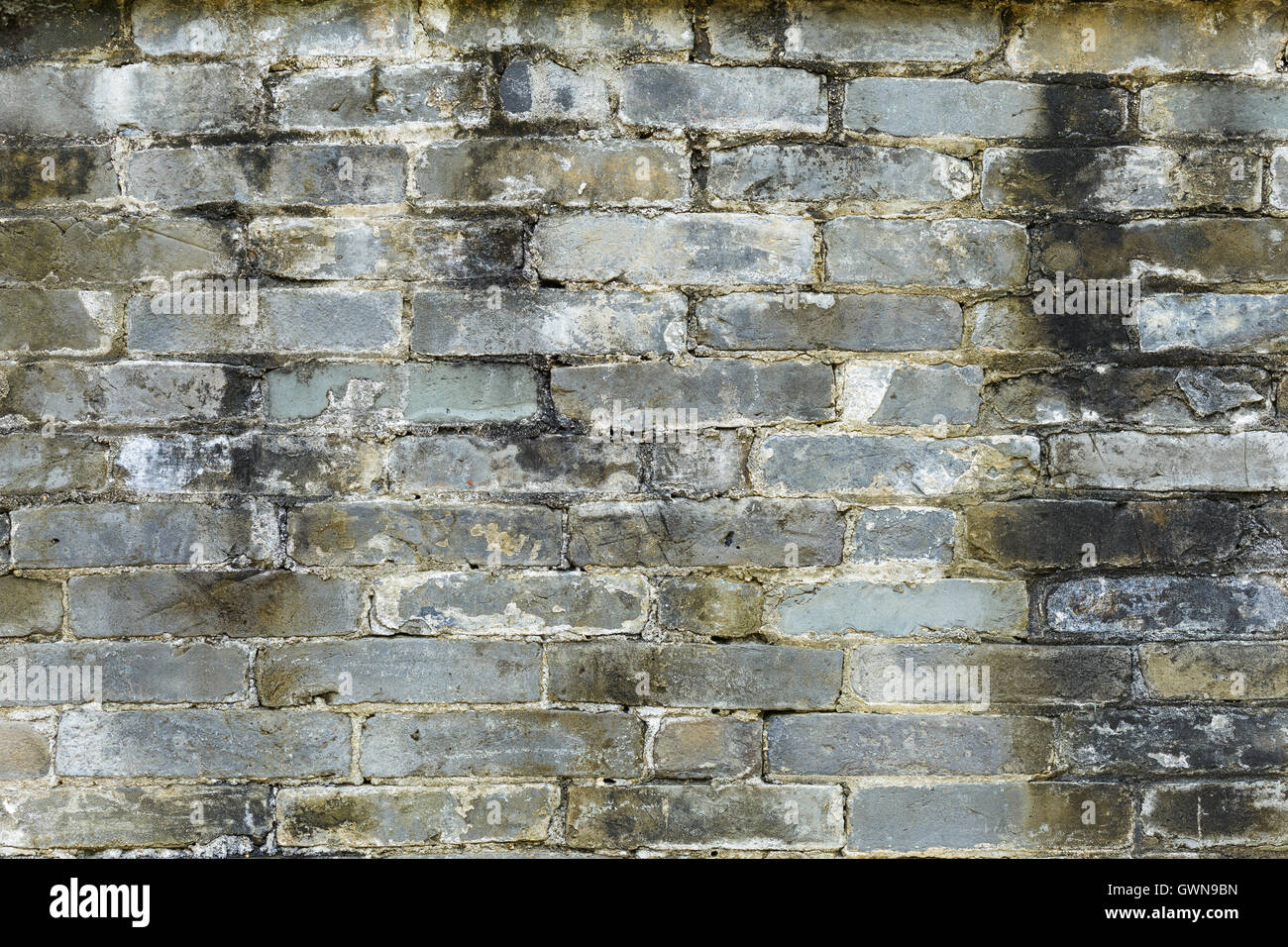 Ancient gray brick wall Stock Photo - Alamy