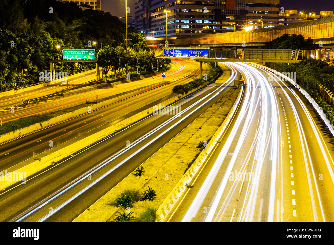 Busy traffic on highway at night Stock Photo - Alamy