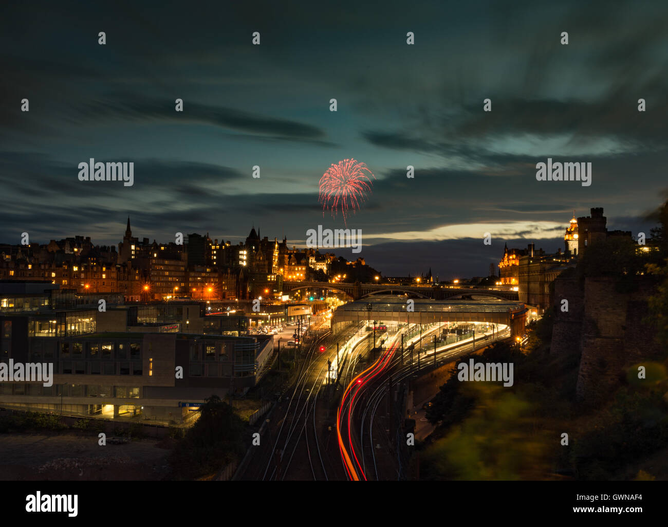 Firework explodes over Edinburgh Castle in this long exposure shot over ...