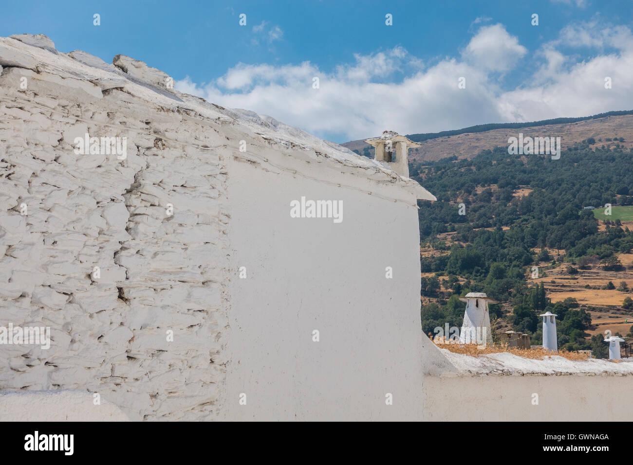 Unique chimneys of Capileira, Spain, a "white village Stock Photo - Alamy