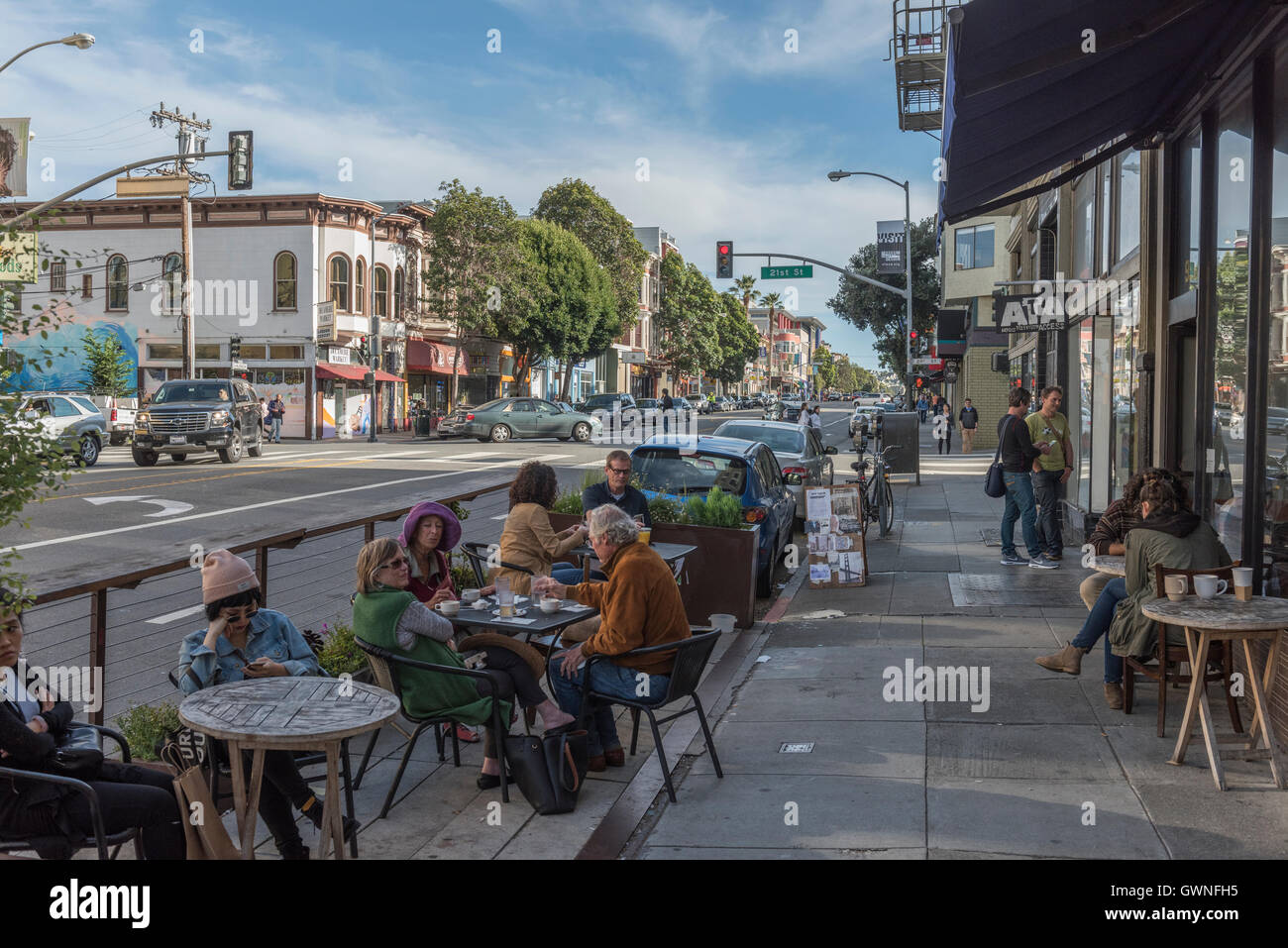 General street view on Valencia Street near the junction of 21st Street ...