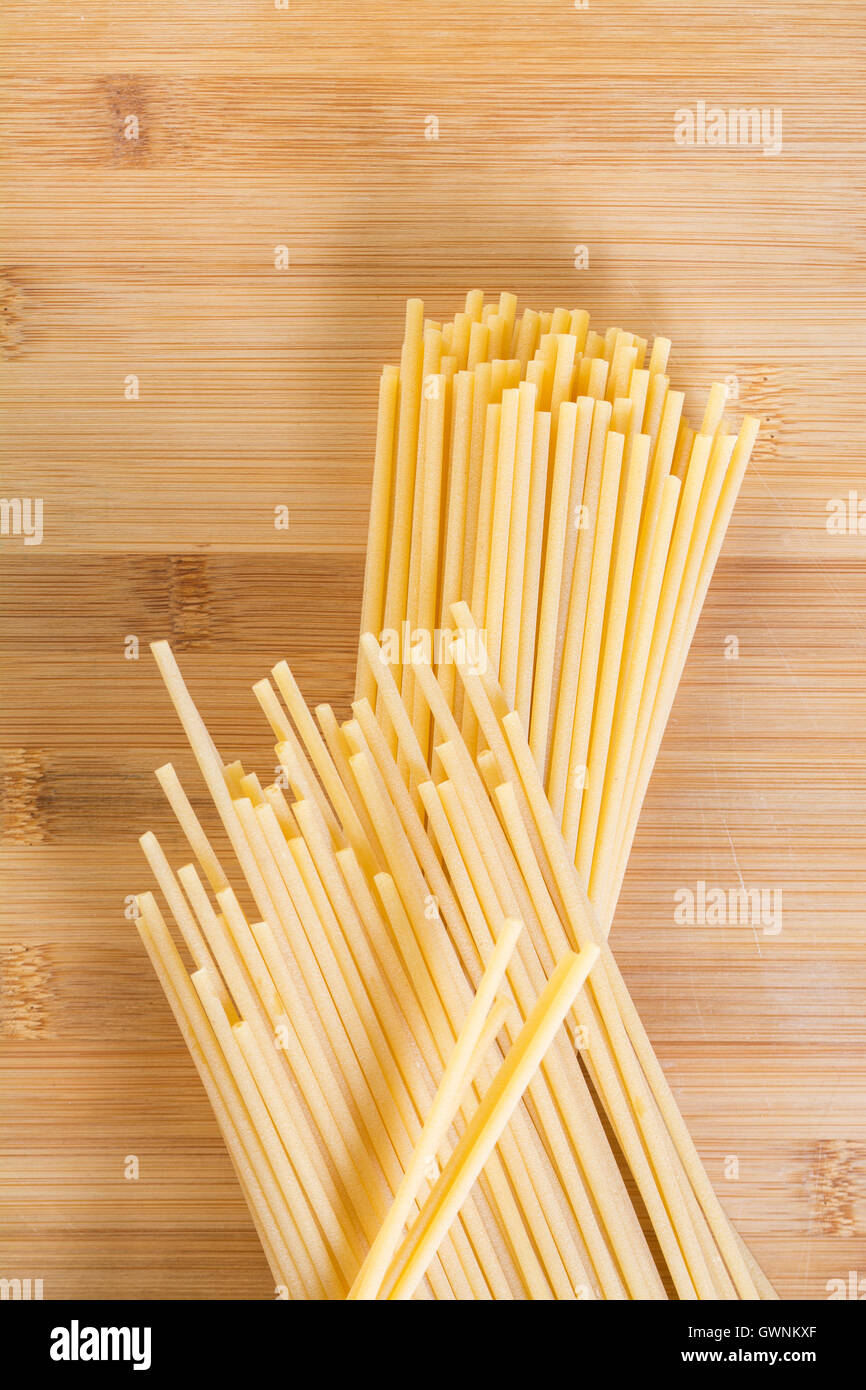 raw pasta spaghetti, italian cuisine Stock Photo - Alamy