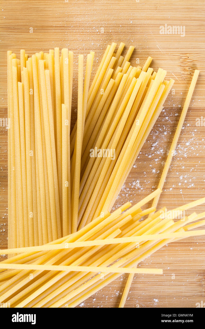 raw pasta spaghetti, italian cuisine Stock Photo - Alamy