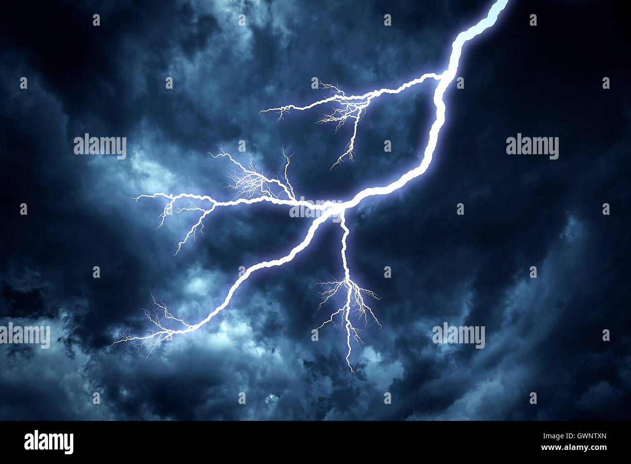 Lightning strike on the cloudy dark sky Stock Photo - Alamy