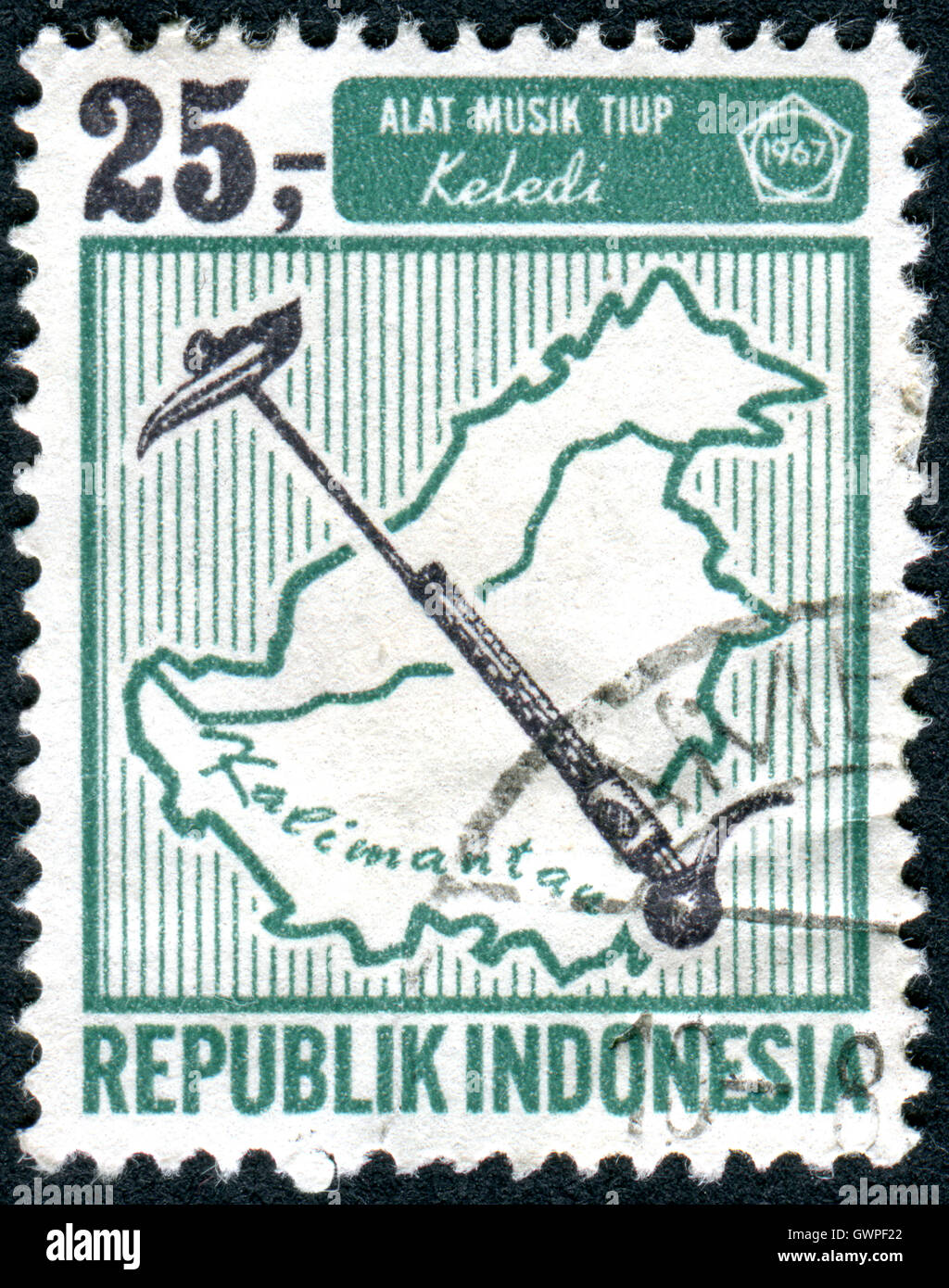 Postage stamp printed in Indonesia, shows Keledi musical instrument (a ...