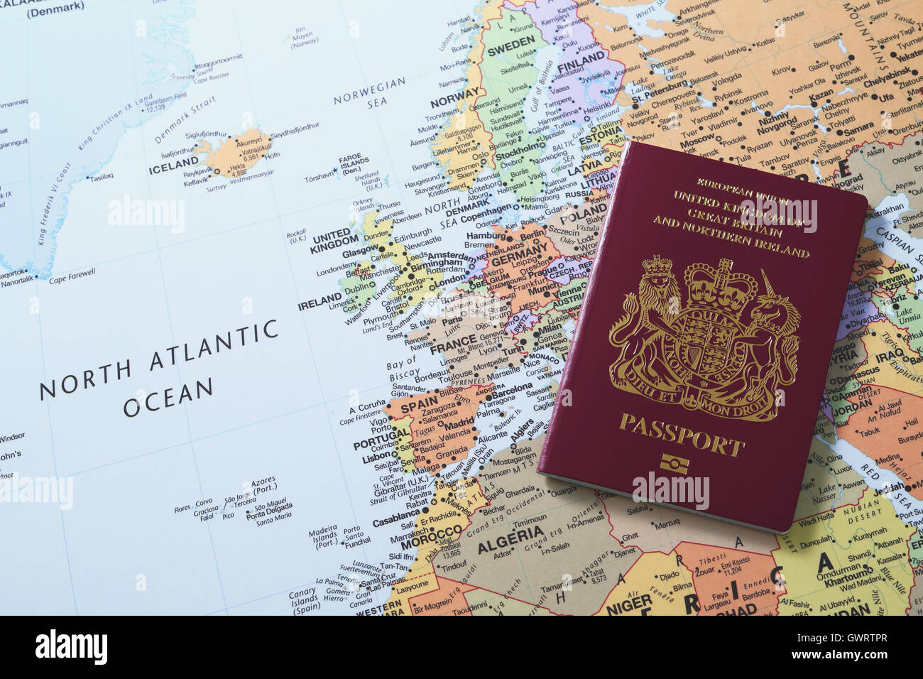 UK passport on world map Stock Photo - Alamy
