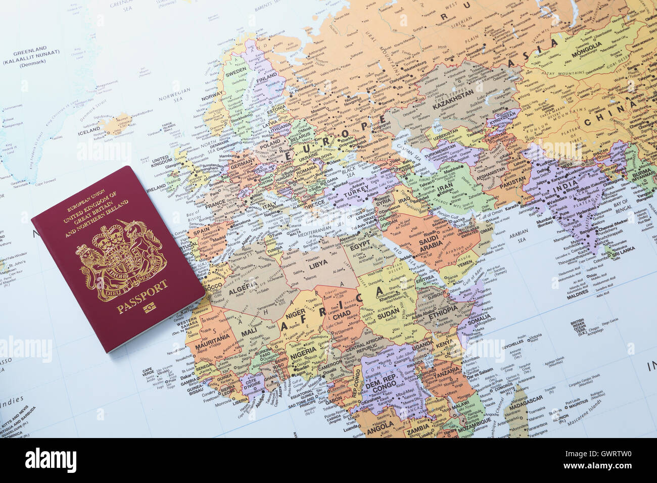 UK passport on world map Stock Photo - Alamy